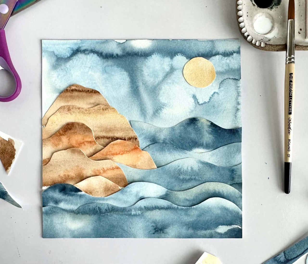 Cómo crear un collage de paisaje marino en acuarela